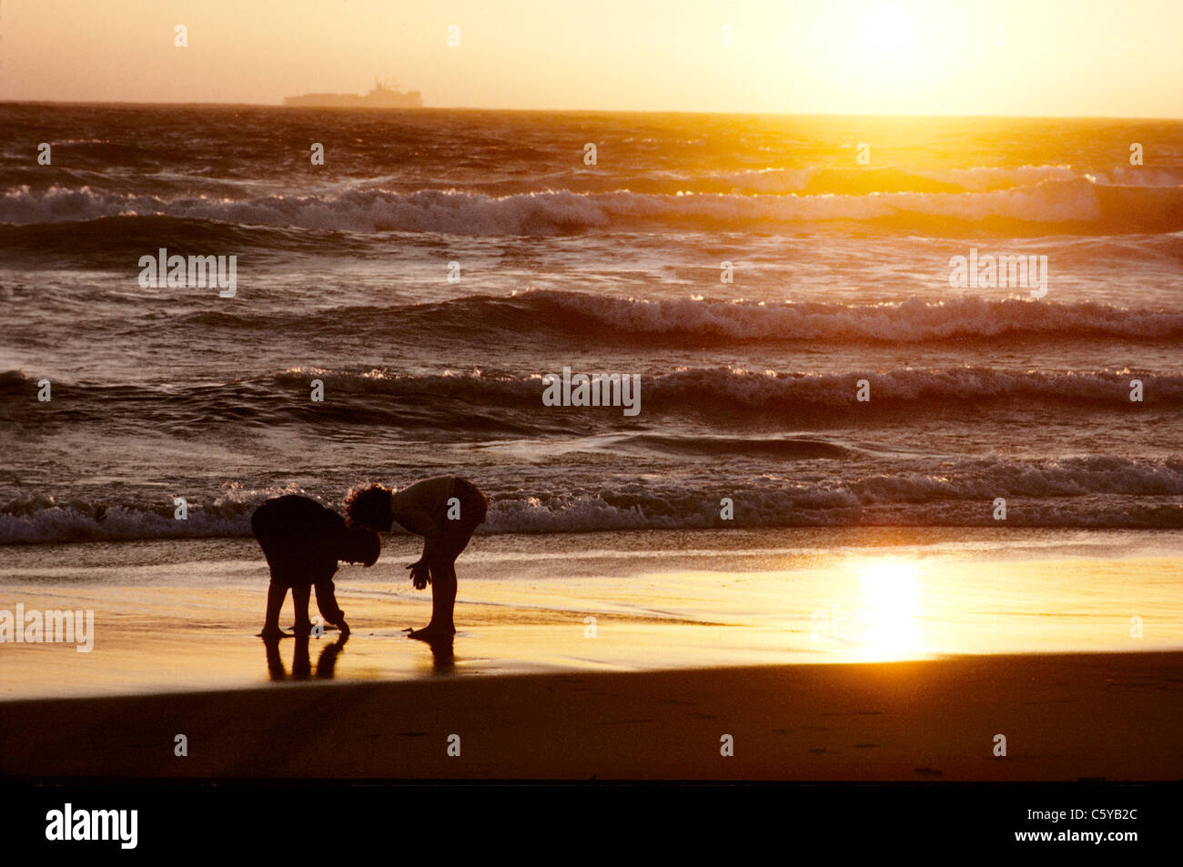 Two boys having fun in ocean hi-res stock photography and images - Alamy