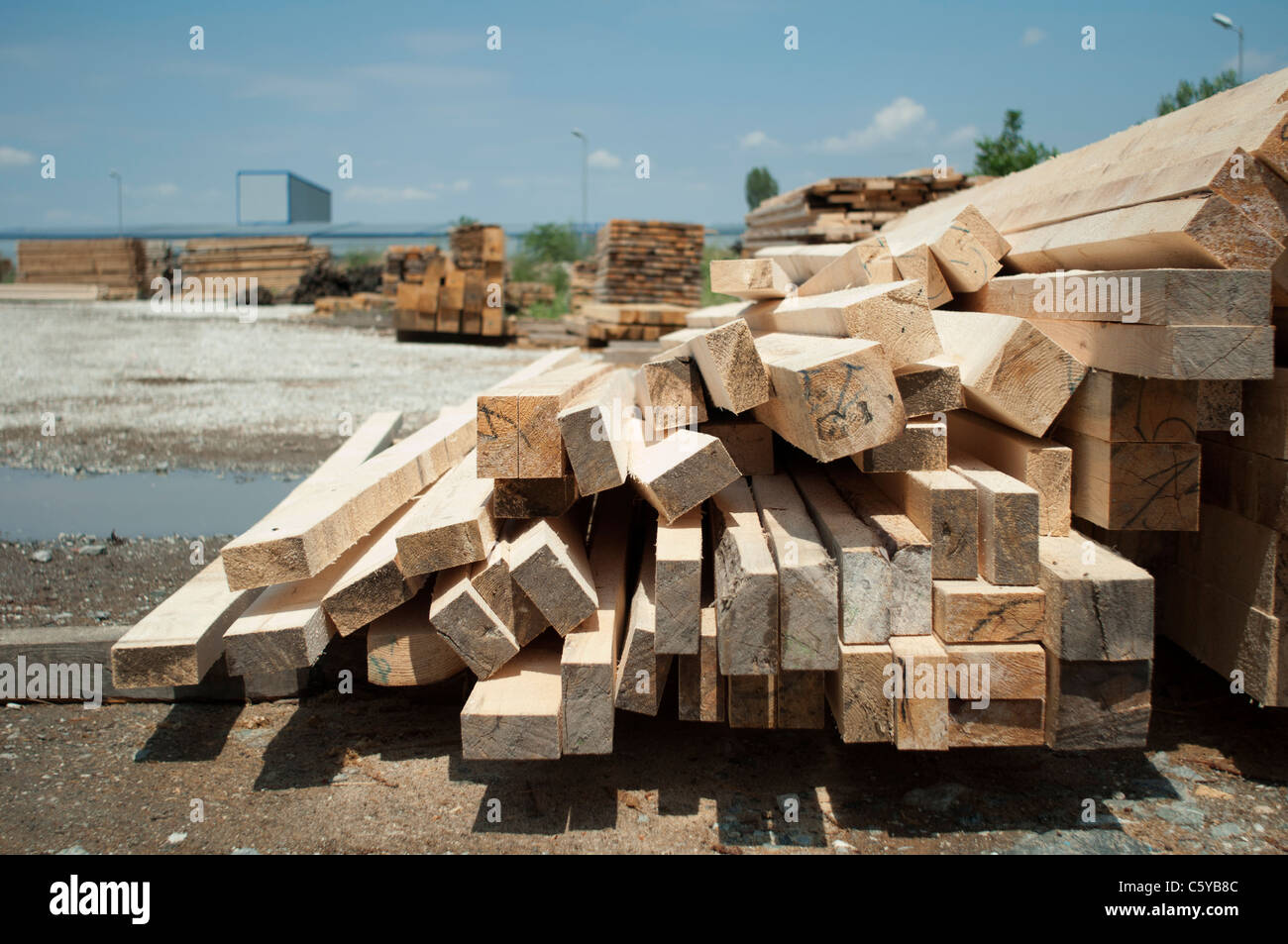 Timber. Planks and beams arranged Stock Photo - Alamy