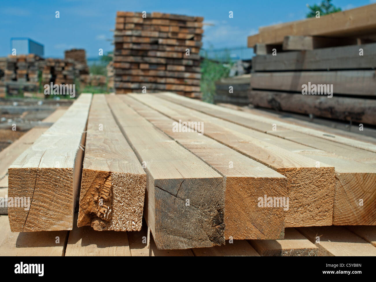 Timber. Planks and beams arranged Stock Photo - Alamy
