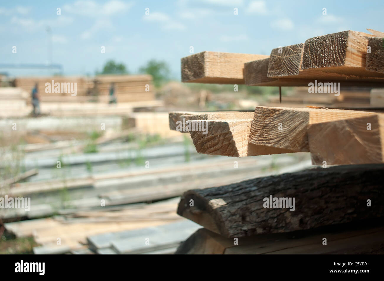 Timber. Planks and beams arranged Stock Photo - Alamy