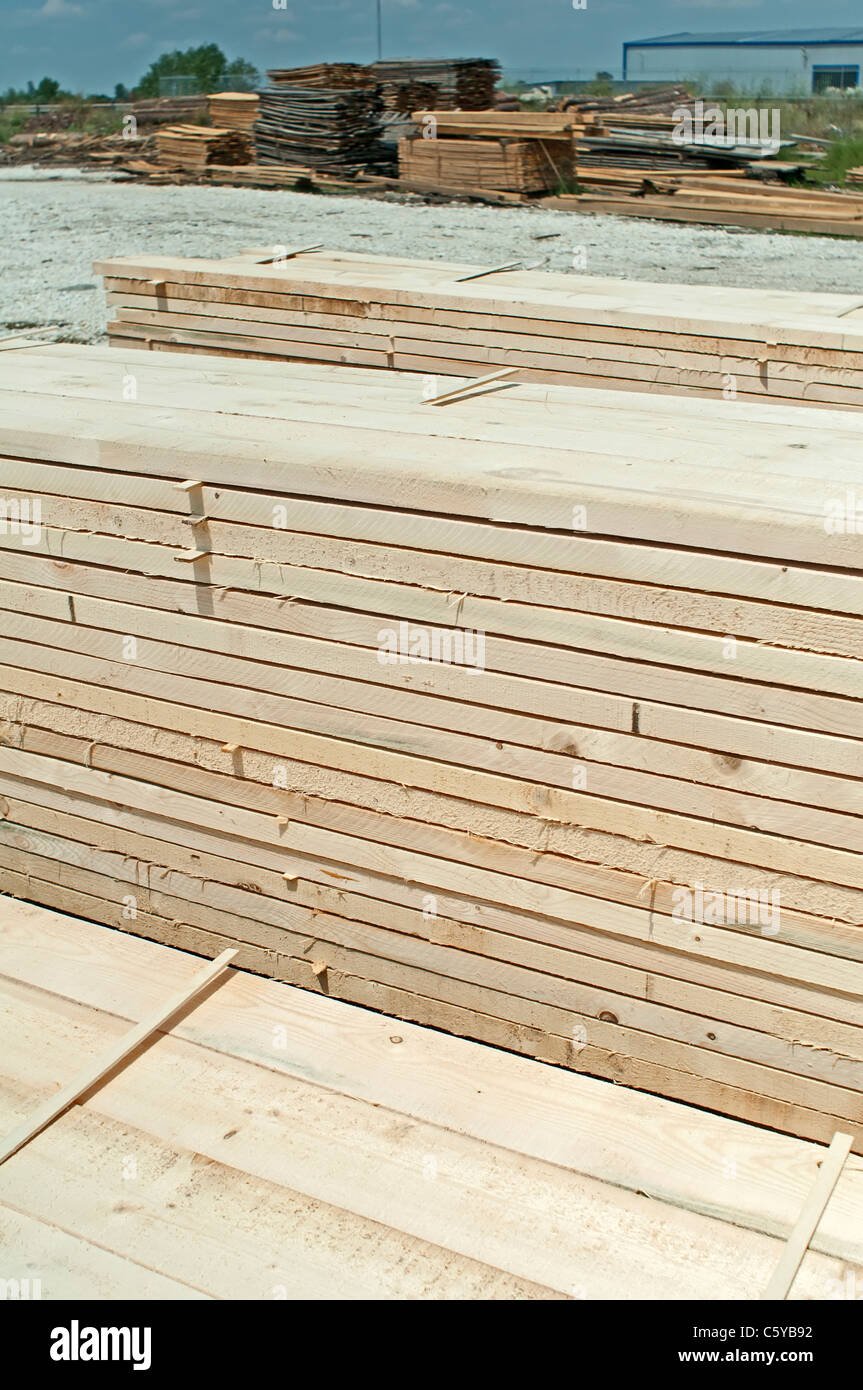 Timber. Planks and beams arranged Stock Photo - Alamy