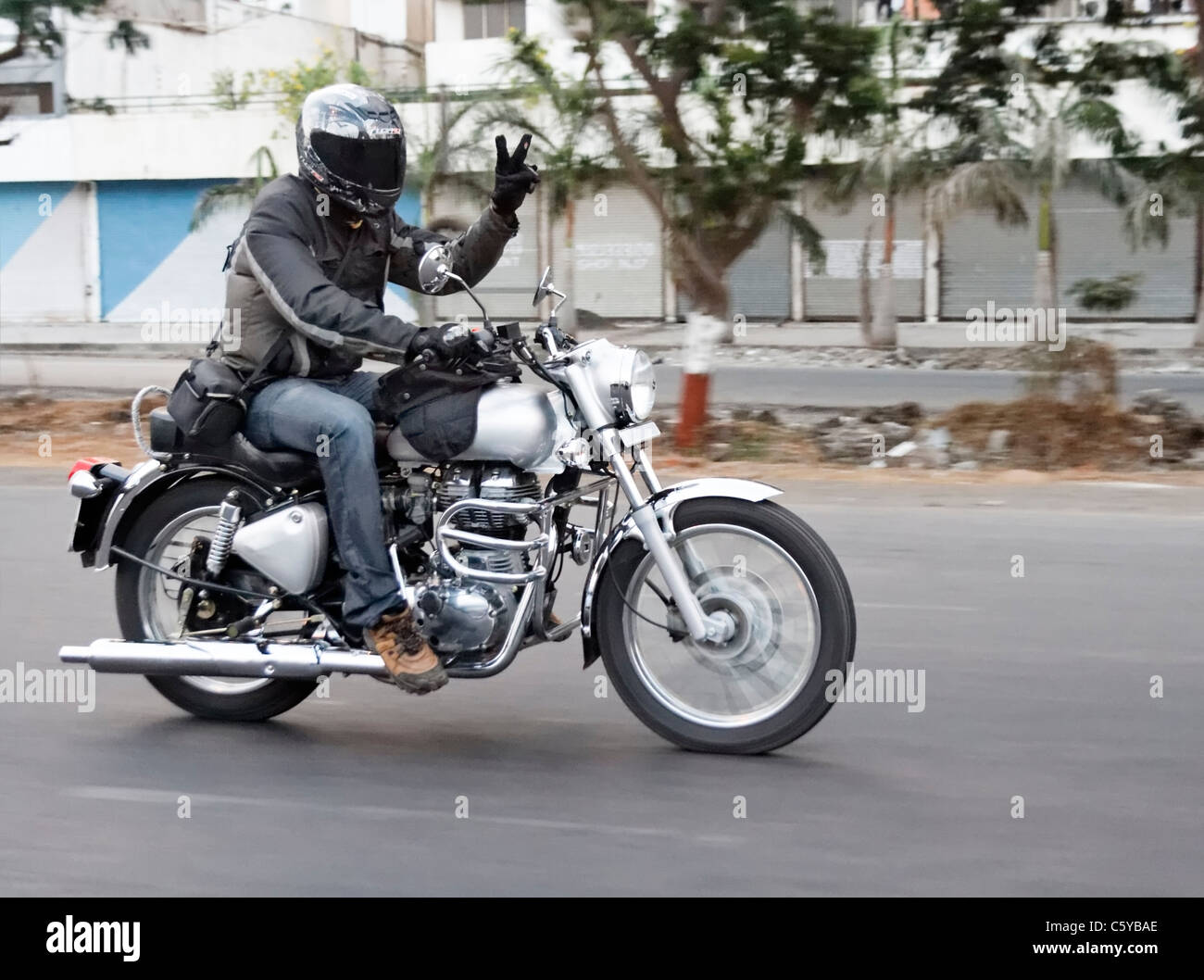 Motorbiker breaks road rules undertaking hi-res stock photography and ...
