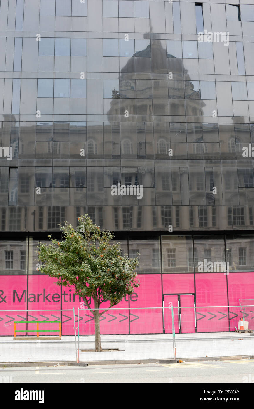 The Port of Liverpool building reflected in mirrored glass in a modern ...