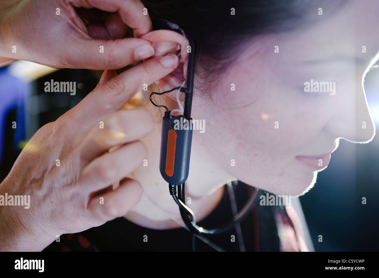 Student ear hearing aid hi-res stock photography and images - Alamy