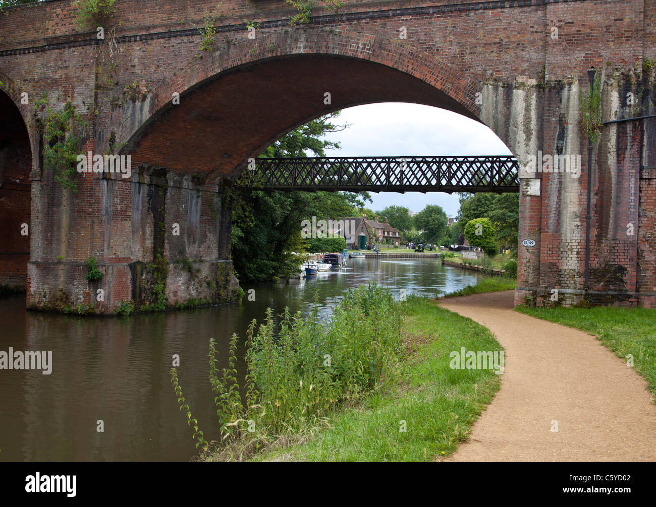 Brick bridge crossing the River Wey in Guildford, Surrey, England Stock ...