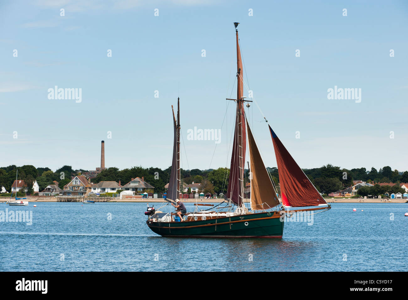 Yacht sailing in Poole Harbor Stock Photo - Alamy