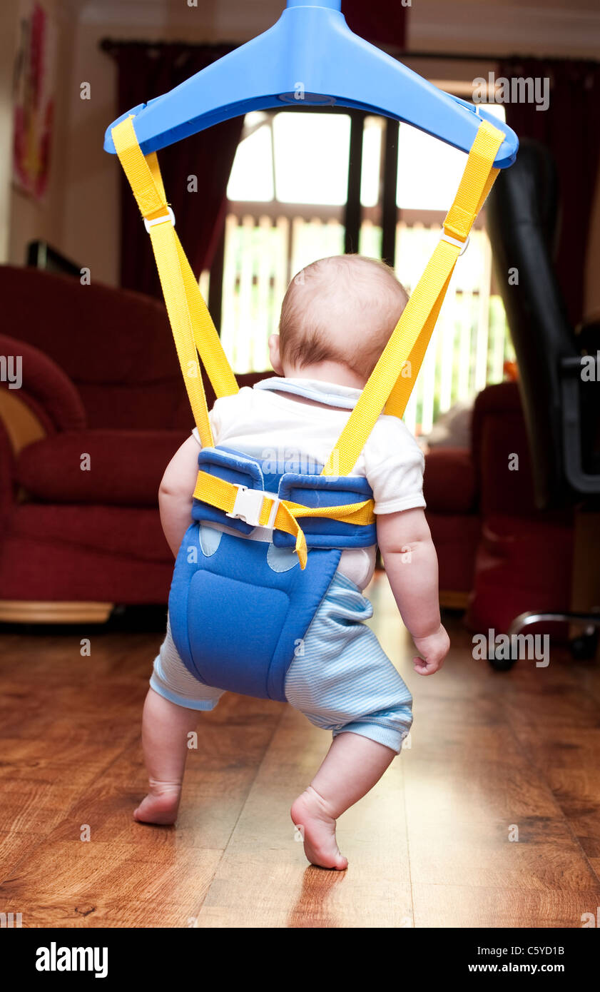 Five months old boy in baby bouncer Stock Photo - Alamy