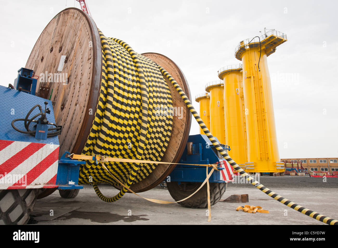 Electric cabling being loaded onto a cable laying vessel for the Walney ...