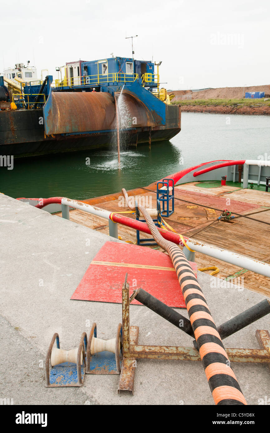 Electric cabling being loaded onto a cable laying vessel for the Walney ...