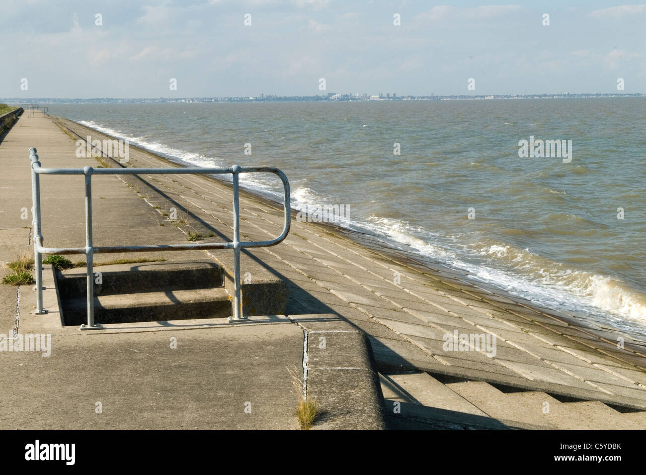 Mouth of the river Thames estuary. Isle of Grain beach looking north ...