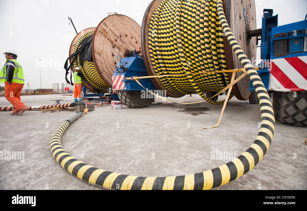 Offshore electric cabling being loaded onto a specialist cable laying ...