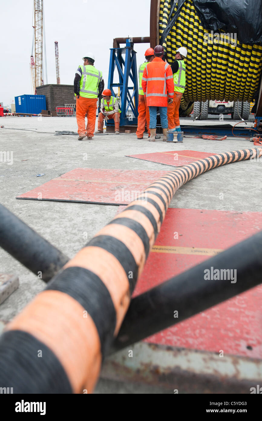 Offshore electric cabling being loaded onto a specialist cable laying ...