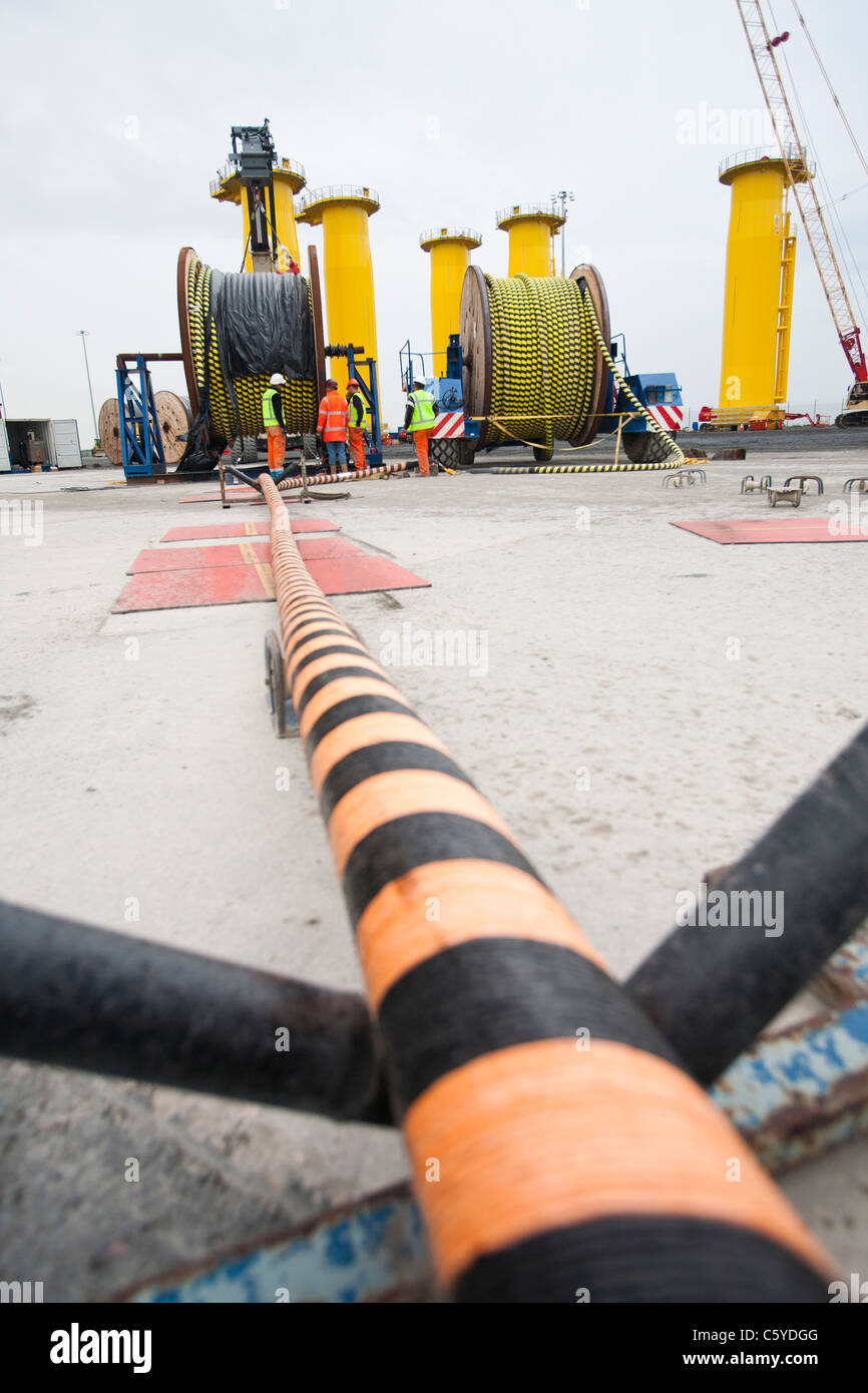 Offshore electric cabling being loaded onto a specialist cable laying ...