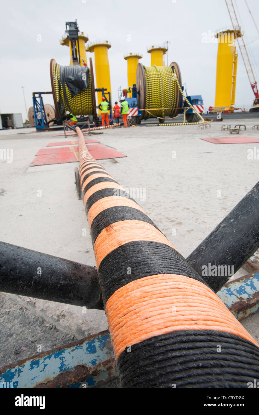 Offshore electric cabling being loaded onto a specialist cable laying ...