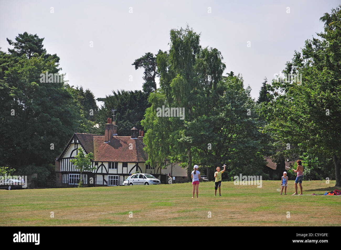 Family playing ball on The Green, Bearsted, Maidstone District, Kent ...