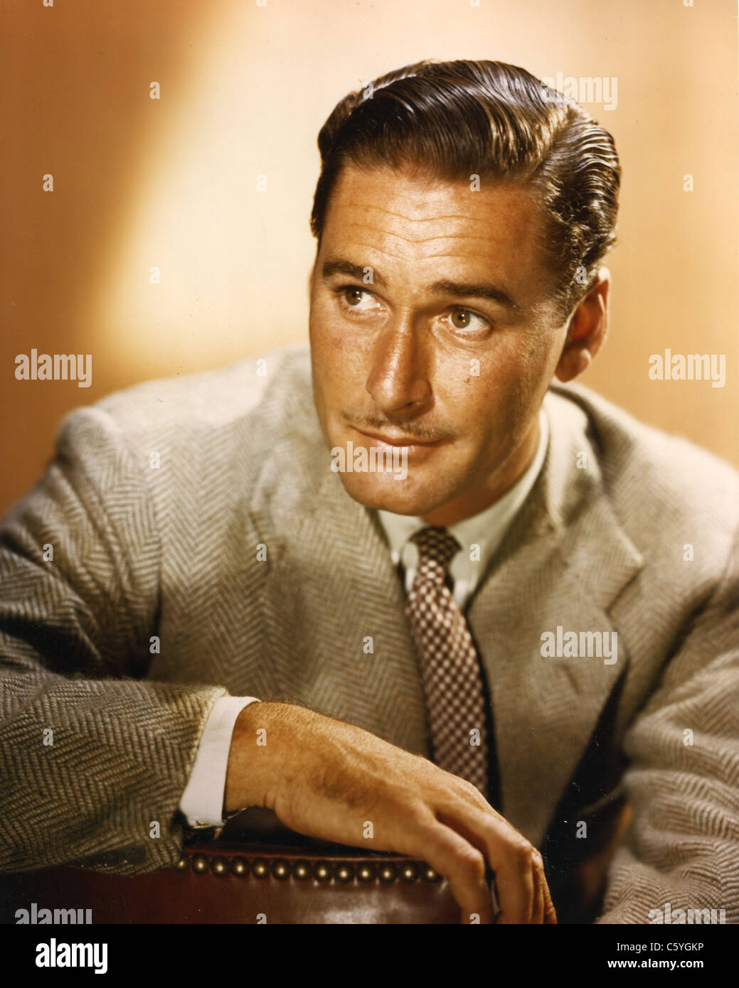 ERROL FLYNN (1909-1959) Australian film actor about 1940 Stock Photo ...