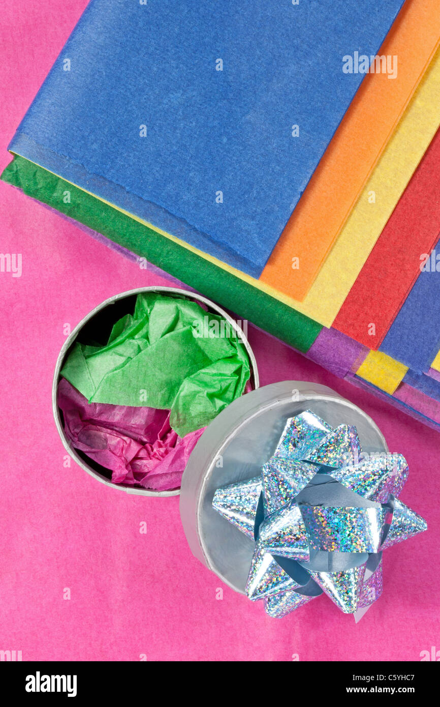Tissue wrapping paper with gift box Stock Photo - Alamy