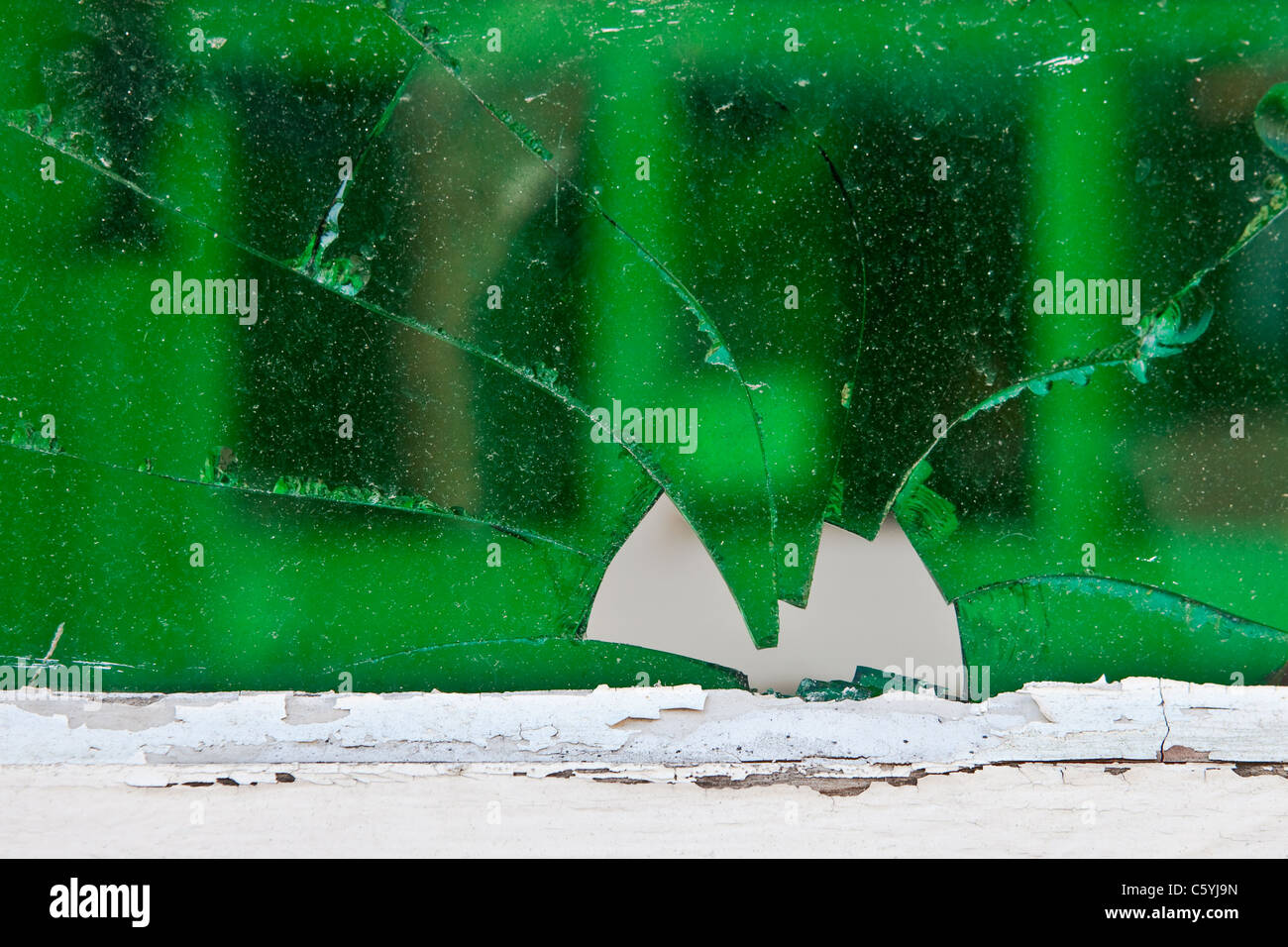 Green glass broken Stock Photo - Alamy