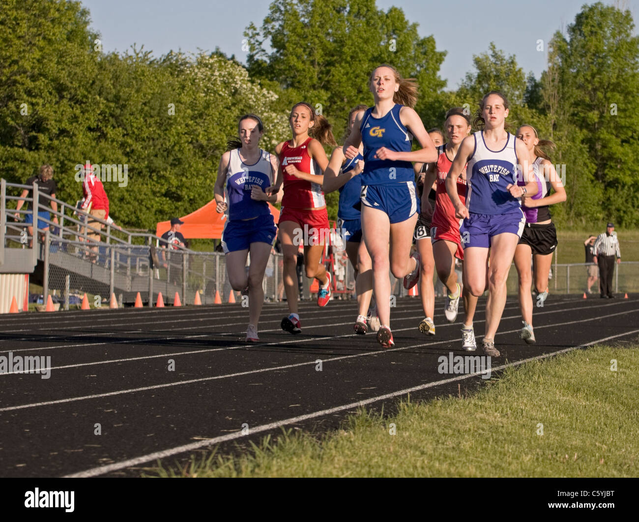 High school girls run in a pack at the sectional track meet in ...