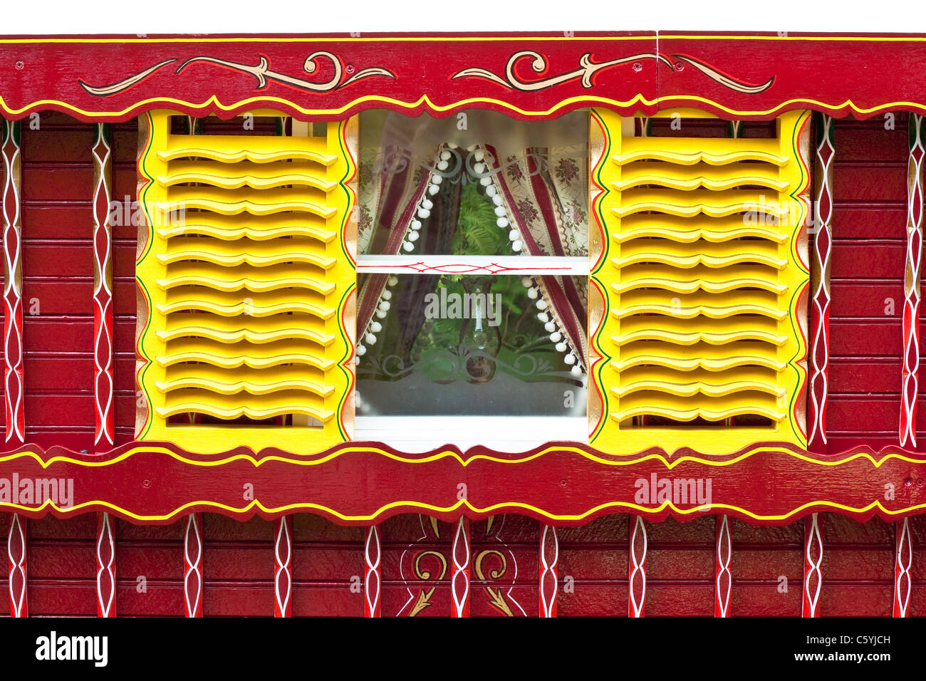 Bright colours of a gypsy caravan window Stock Photo - Alamy