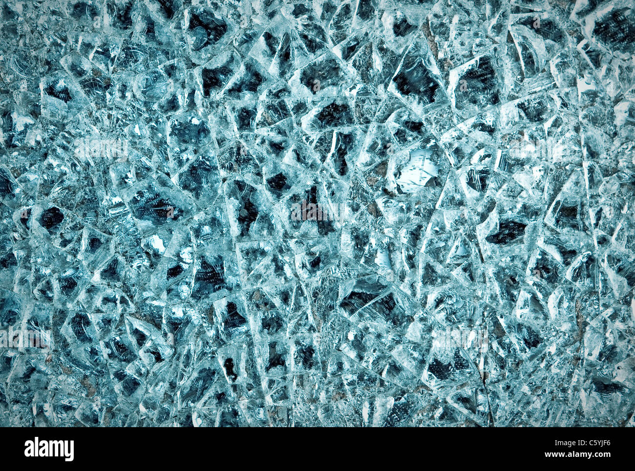 A dramatic shattered glass background in cold tones Stock Photo - Alamy