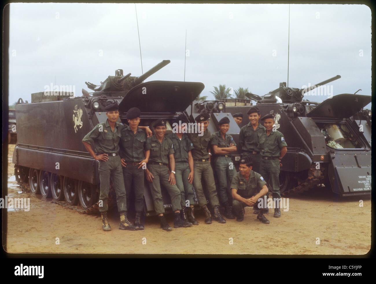 group of soldiers standing next to APCs ARVN Army of Republic of Stock ...