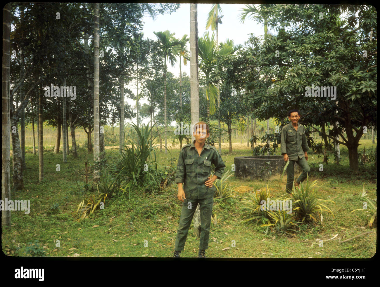 two soldiers standing in jungle ARVN Army of Republic of Vietnam troops during Vietnam War 1971 ...
