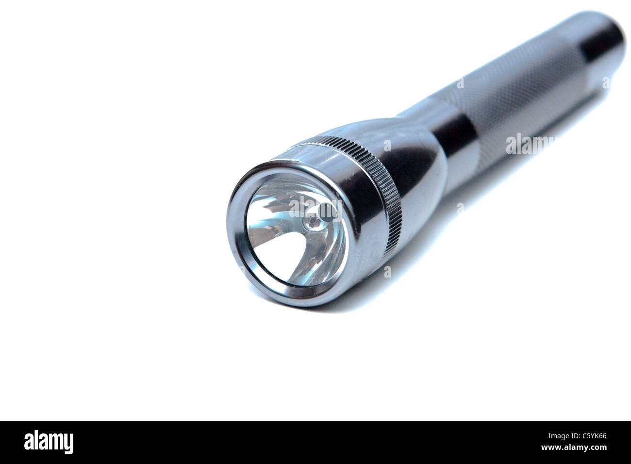 A modern chrome flashlight on white background Stock Photo - Alamy