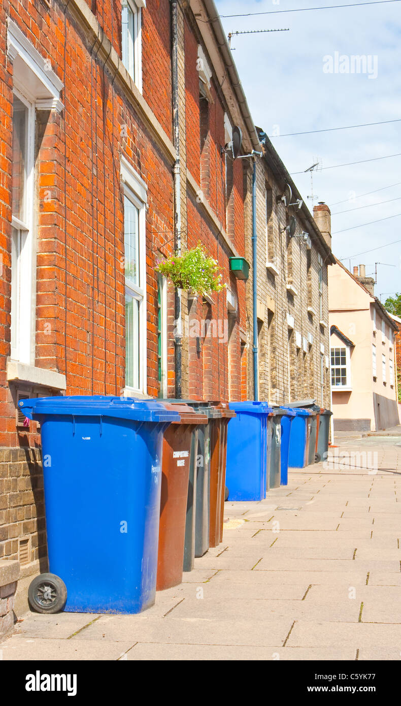 Row of plastic wheely bins outside terraced houses in England Stock ...