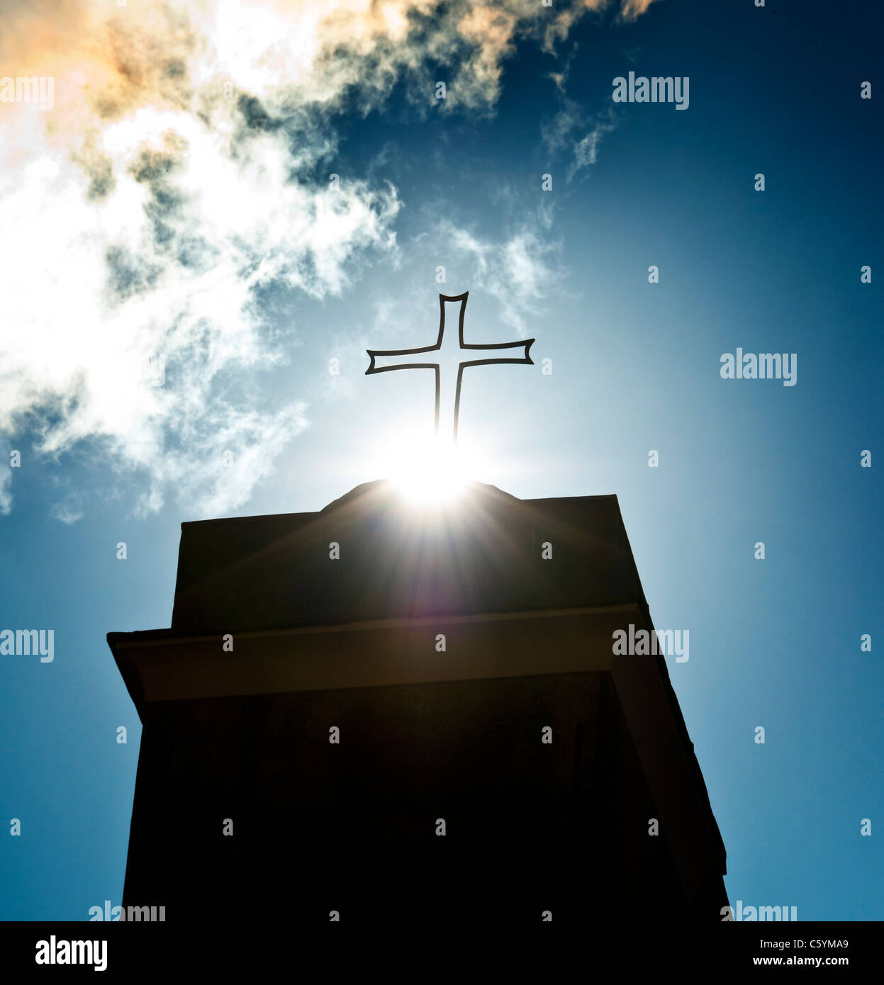 Image of cross sign from a church with the beams of sunshine on the ...