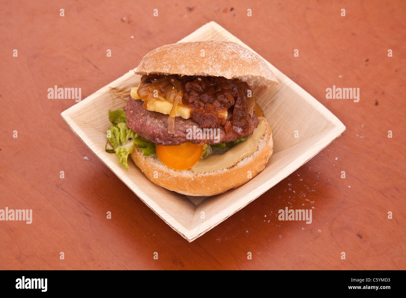 Gourmet beefburger on a square plate, Suffolk, England, United Kingdom ...