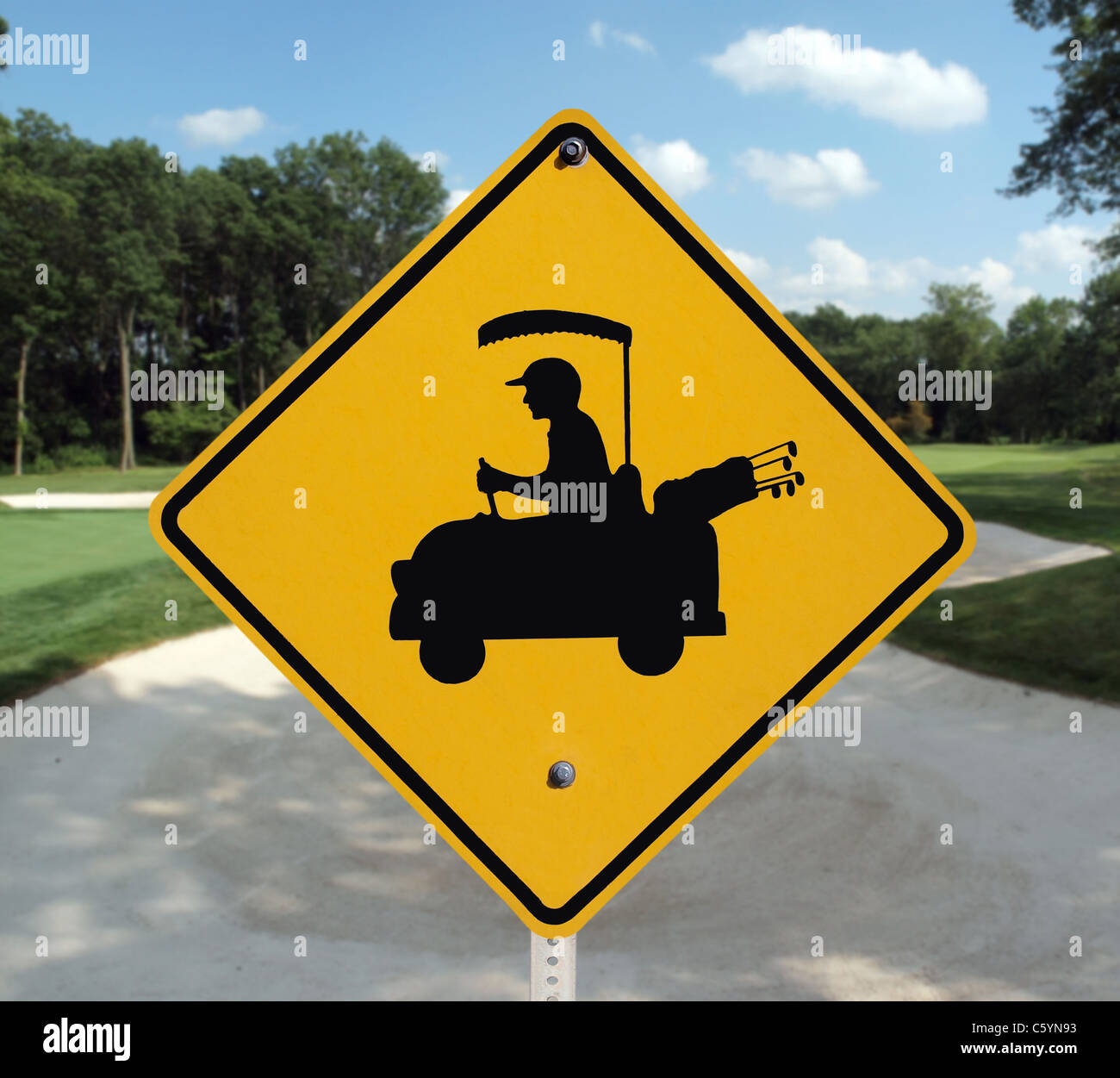 Golf cart crossing sign and sand trap Stock Photo - Alamy