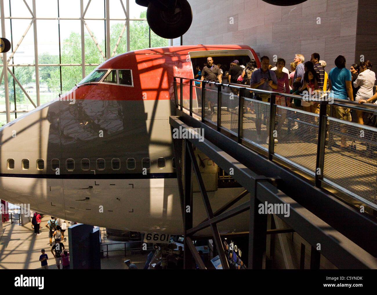 Visitors view the cockpit exhibit of a Boeing 747 at the National Air ...