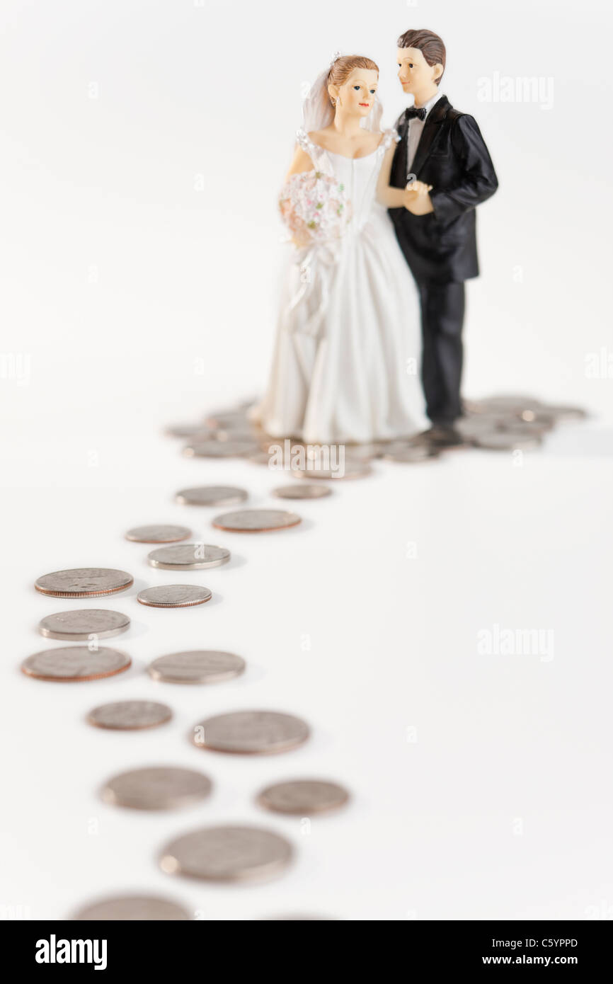 Bride and groom on money path Stock Photo - Alamy
