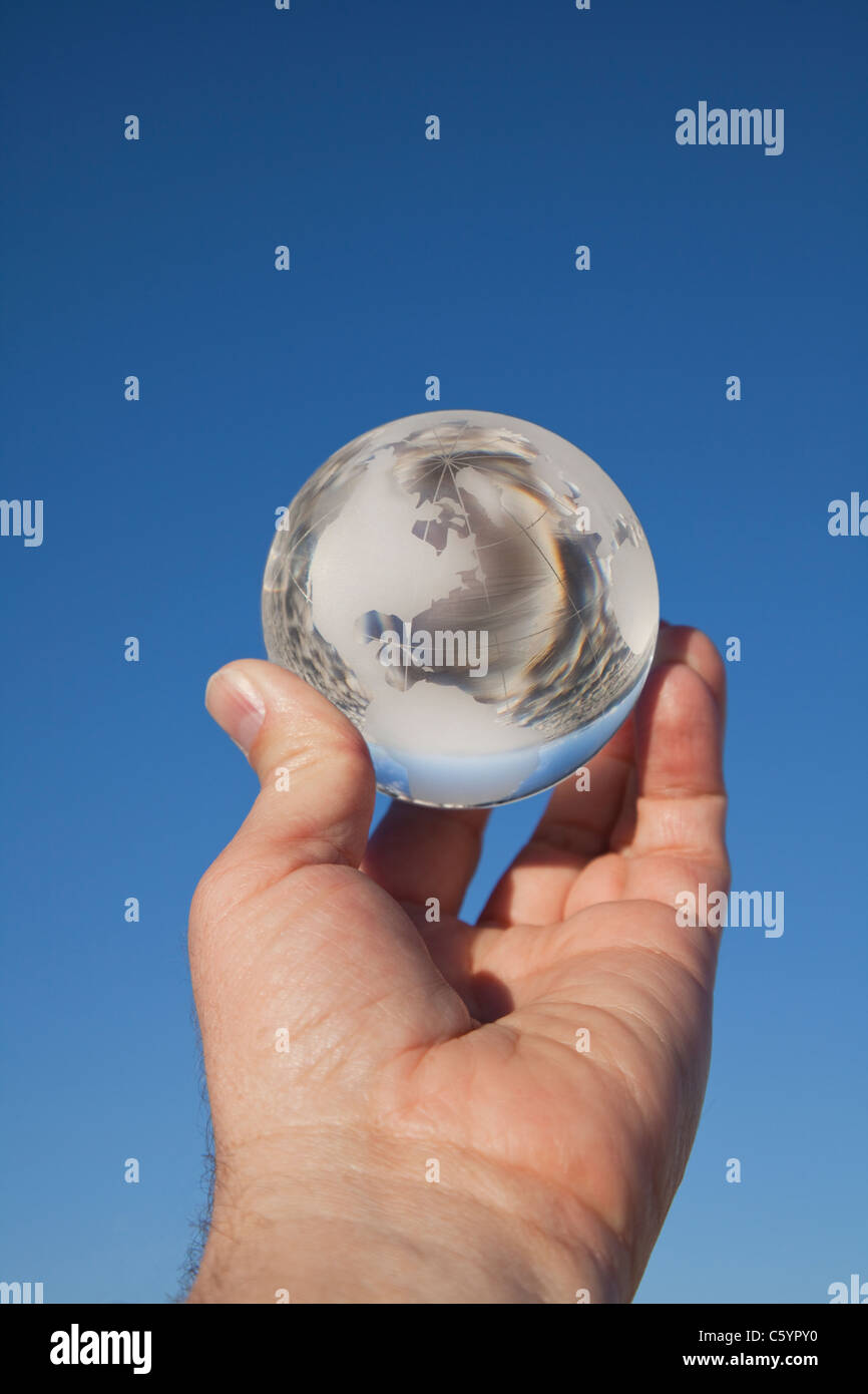 Male hand with glass ball hi-res stock photography and images - Alamy