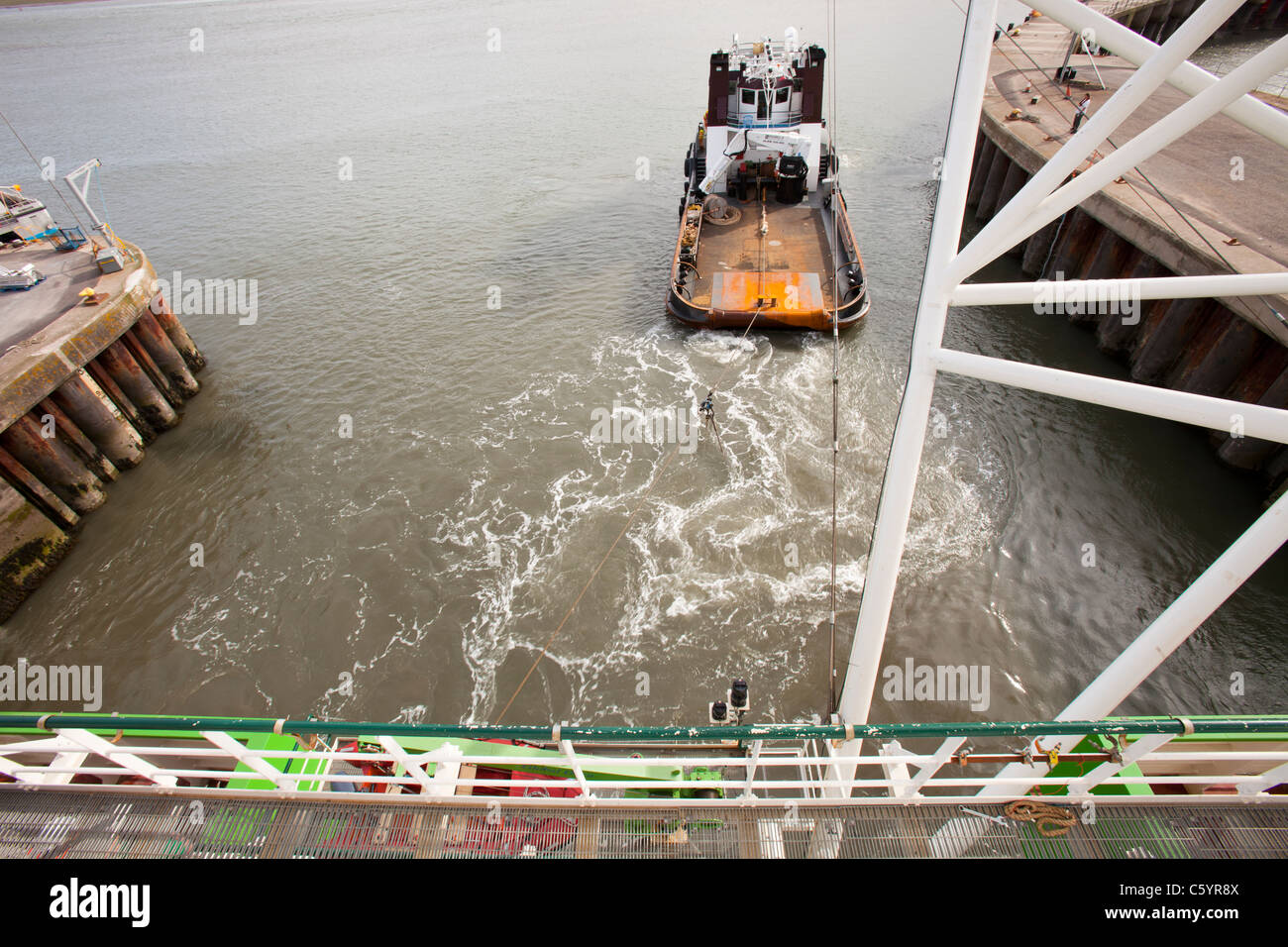 A tug boat towing a jack up barge, the Goliath, out to work on the ...