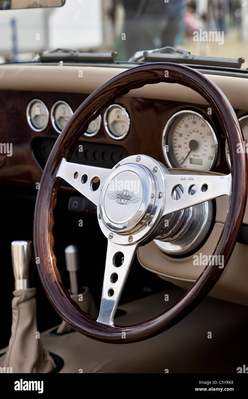 Steering wheel and dashboard of Morgan Plus Four sportscar Stock Photo ...