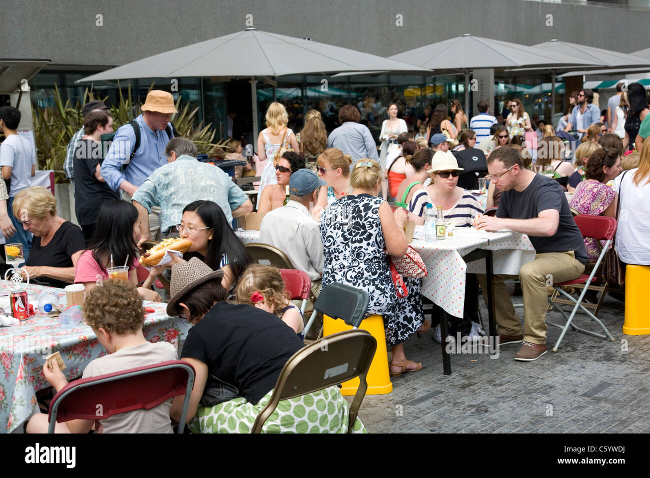 People eating at tables at Food Festival on South Bank Stock Photo - Alamy