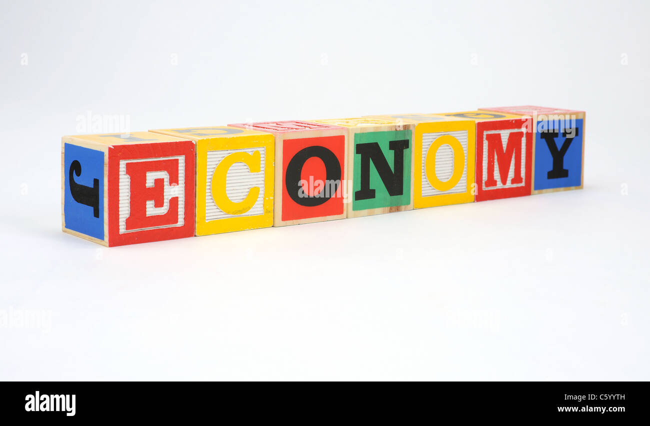 the word 'economy' spelled with children's letter blocks Stock Photo ...
