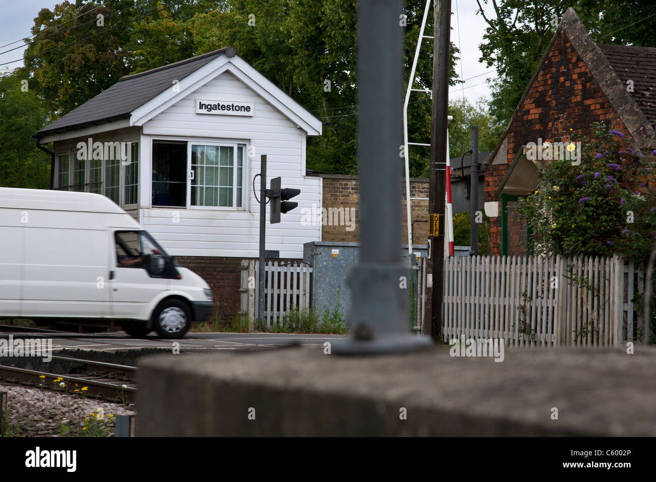 White Van at Level Crossing and Signal Box at Ingatestone Stock Photo ...