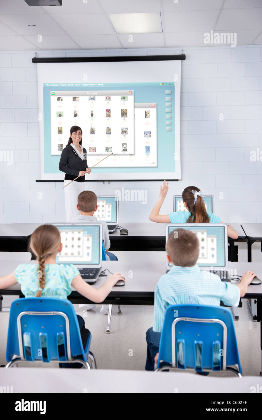 Children with laptop presentation hi-res stock photography and images ...