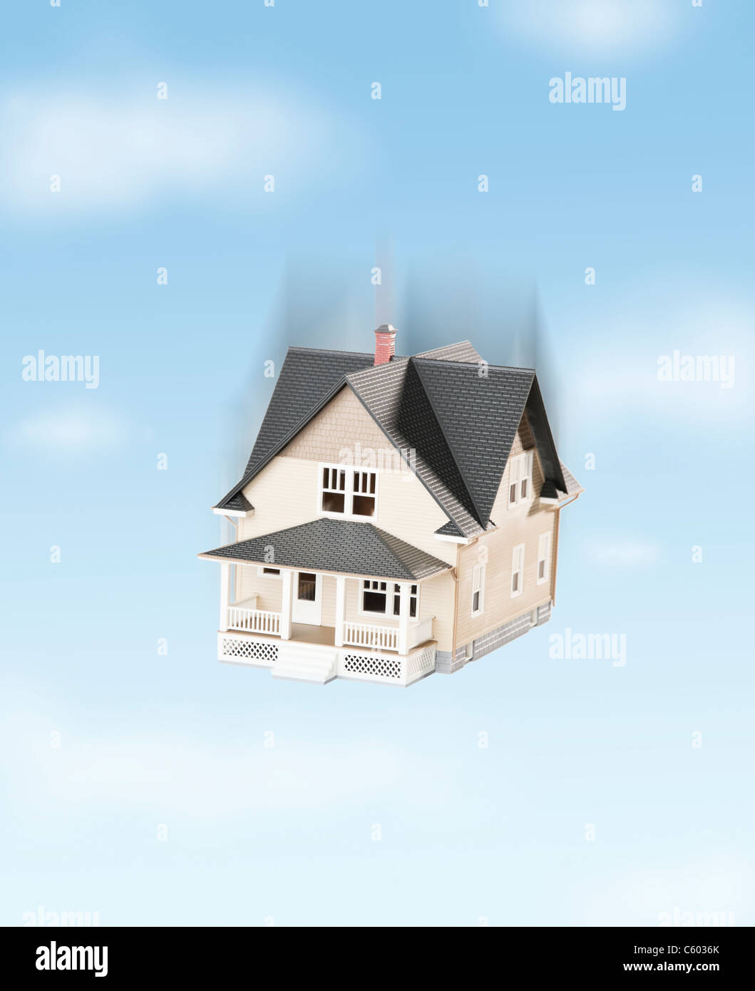 Model house falling down Stock Photo - Alamy