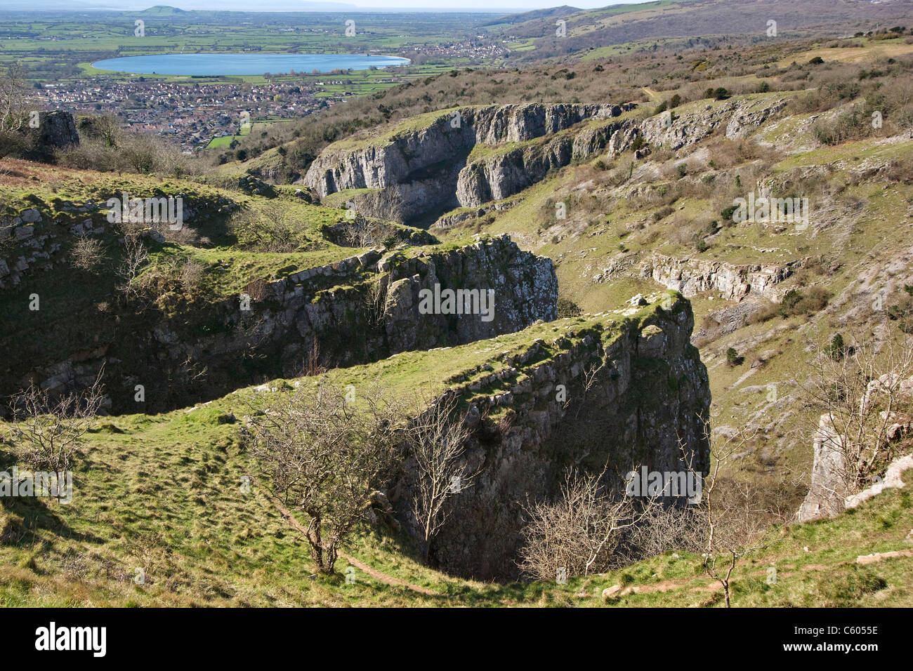 View over the Cheddar Gorge past Cheddar town to the circular Cheddar ...