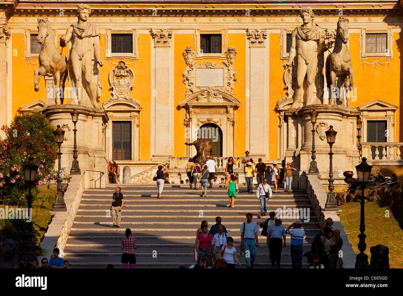Tourist walk the Cordonata staircase designed by Michelangelo leading ...