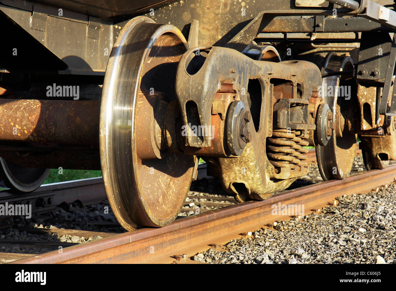 On the right track: Close-up of the rusted wheels and suspension of a ...