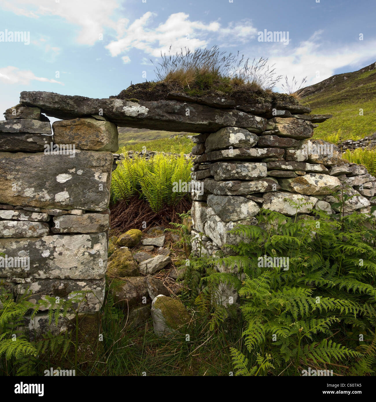 Stone doorway of ruined old croft building, Boreraig, Isle of Skye ...