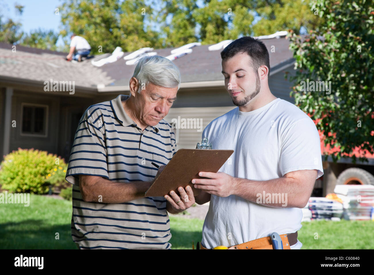 Signing document construction hi-res stock photography and images - Alamy