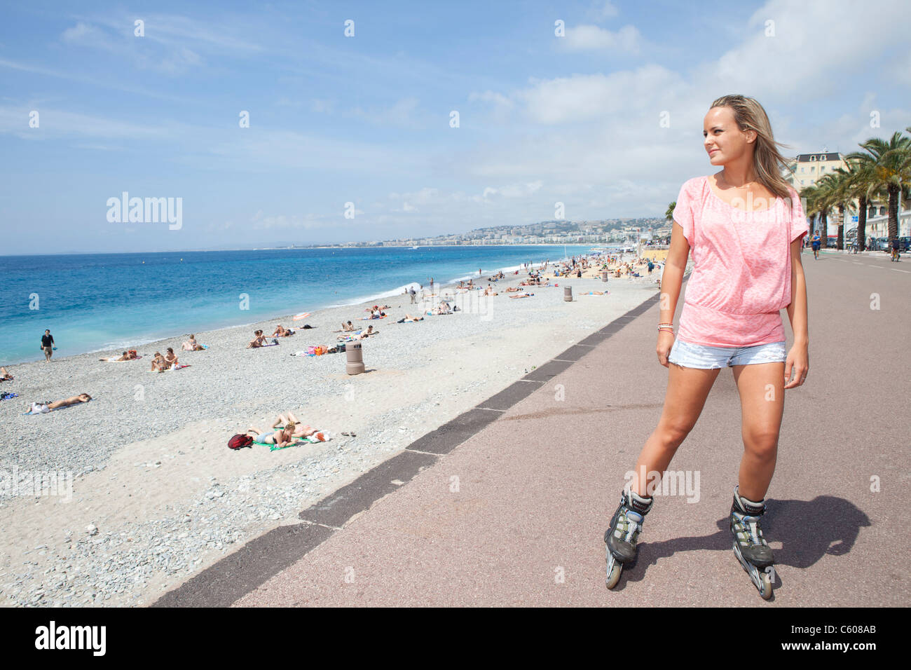 woman on rollerskates seafront beach Nice France Stock Photo - Alamy