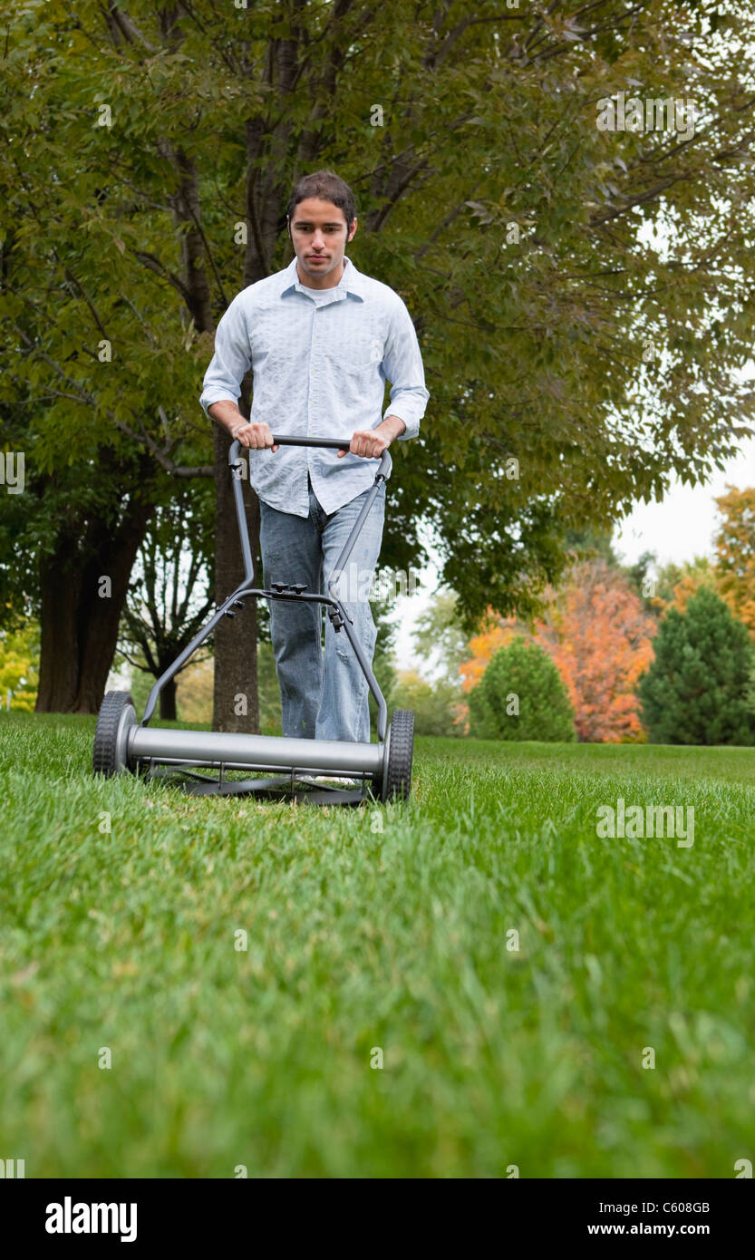 Man mowing lawn low hi-res stock photography and images - Alamy