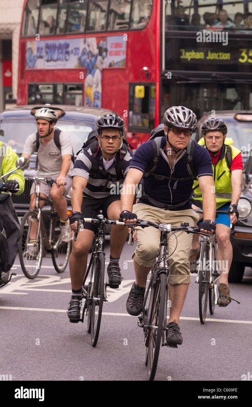London bicycle commuters make their way through the traffic Stock Photo ...